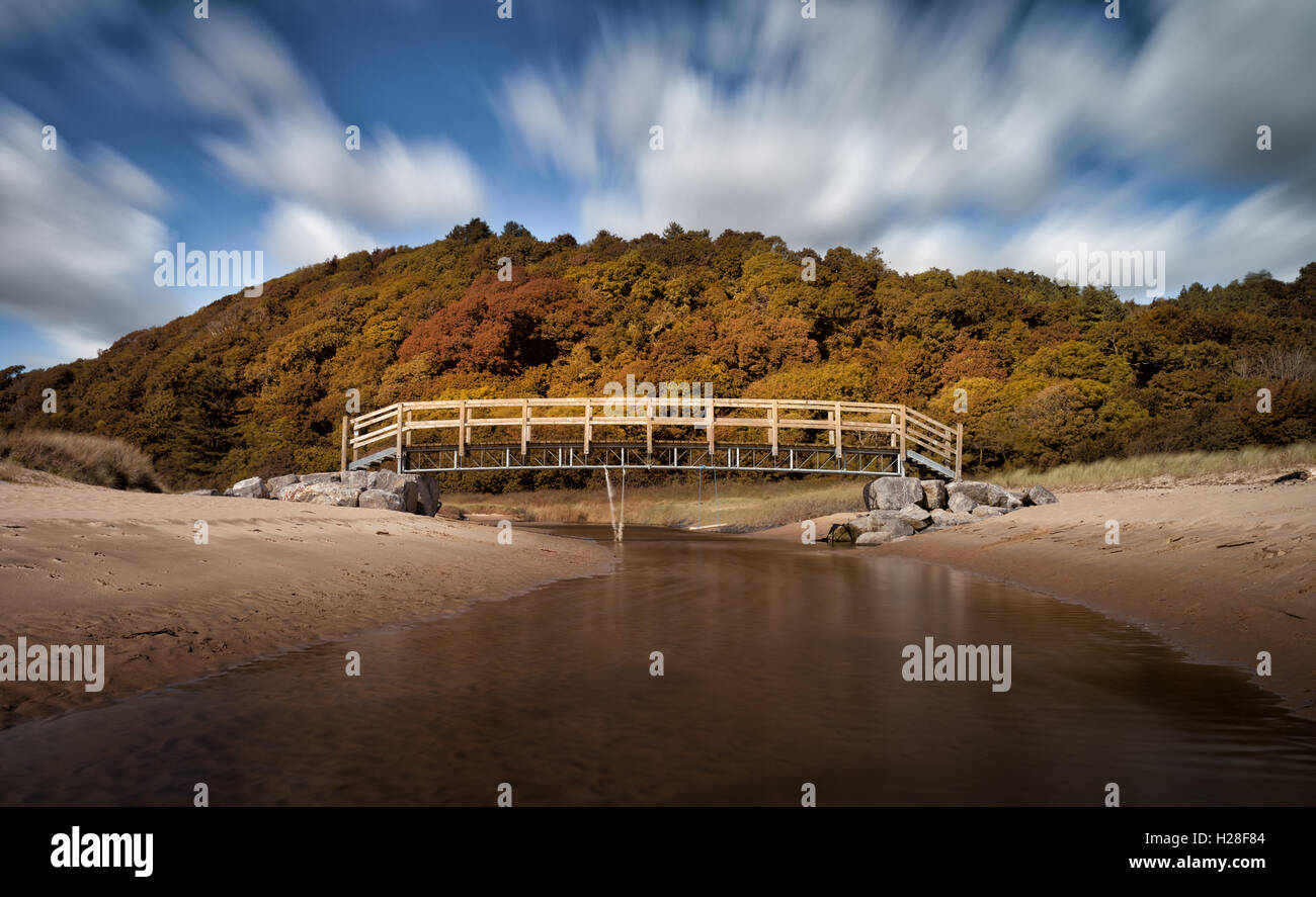 Oxwich Bay river footbridge Stock Photo - Alamy