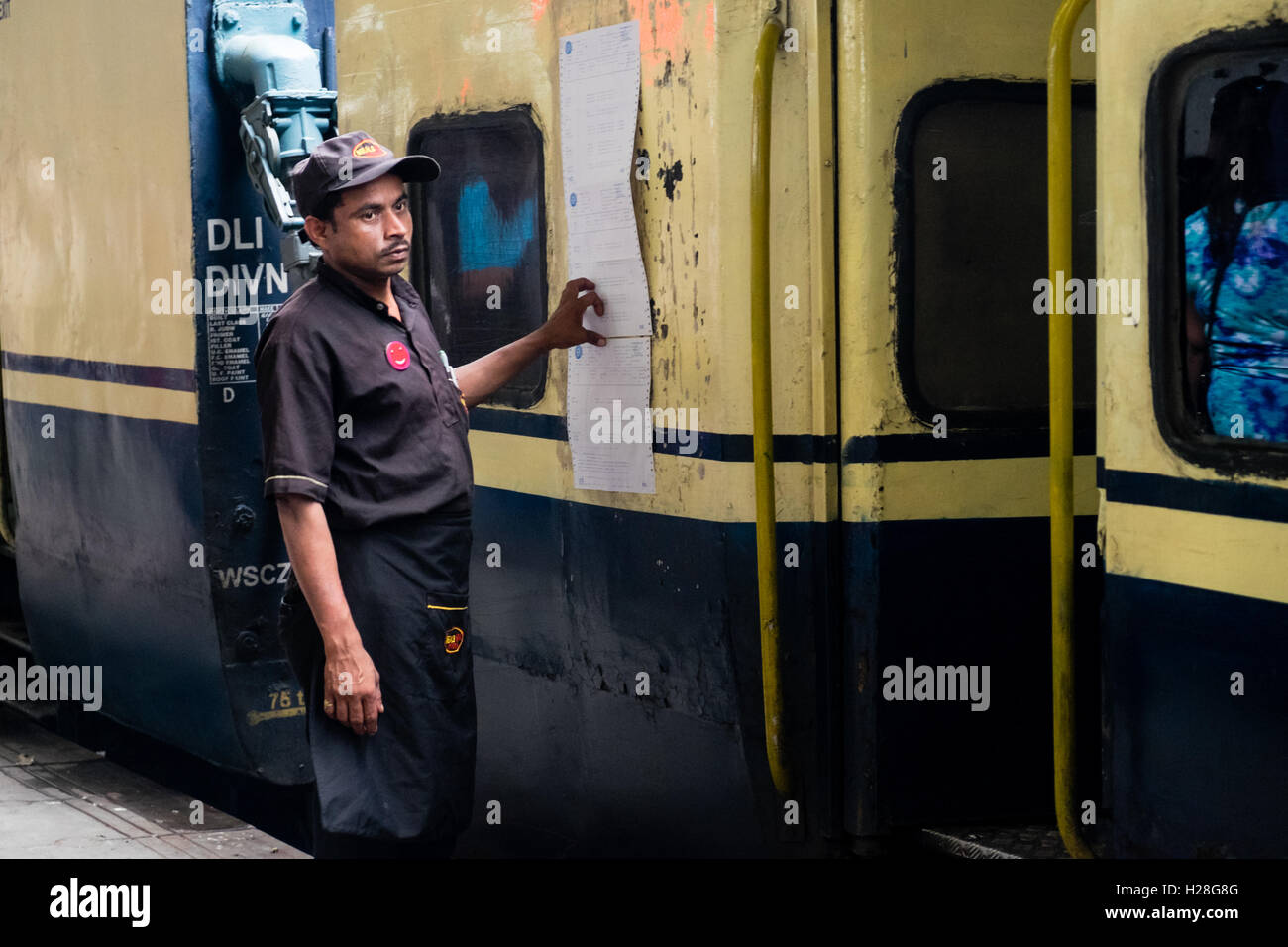 Waiting for a train at The New Delhi Railway Station, New Delhi, India ...