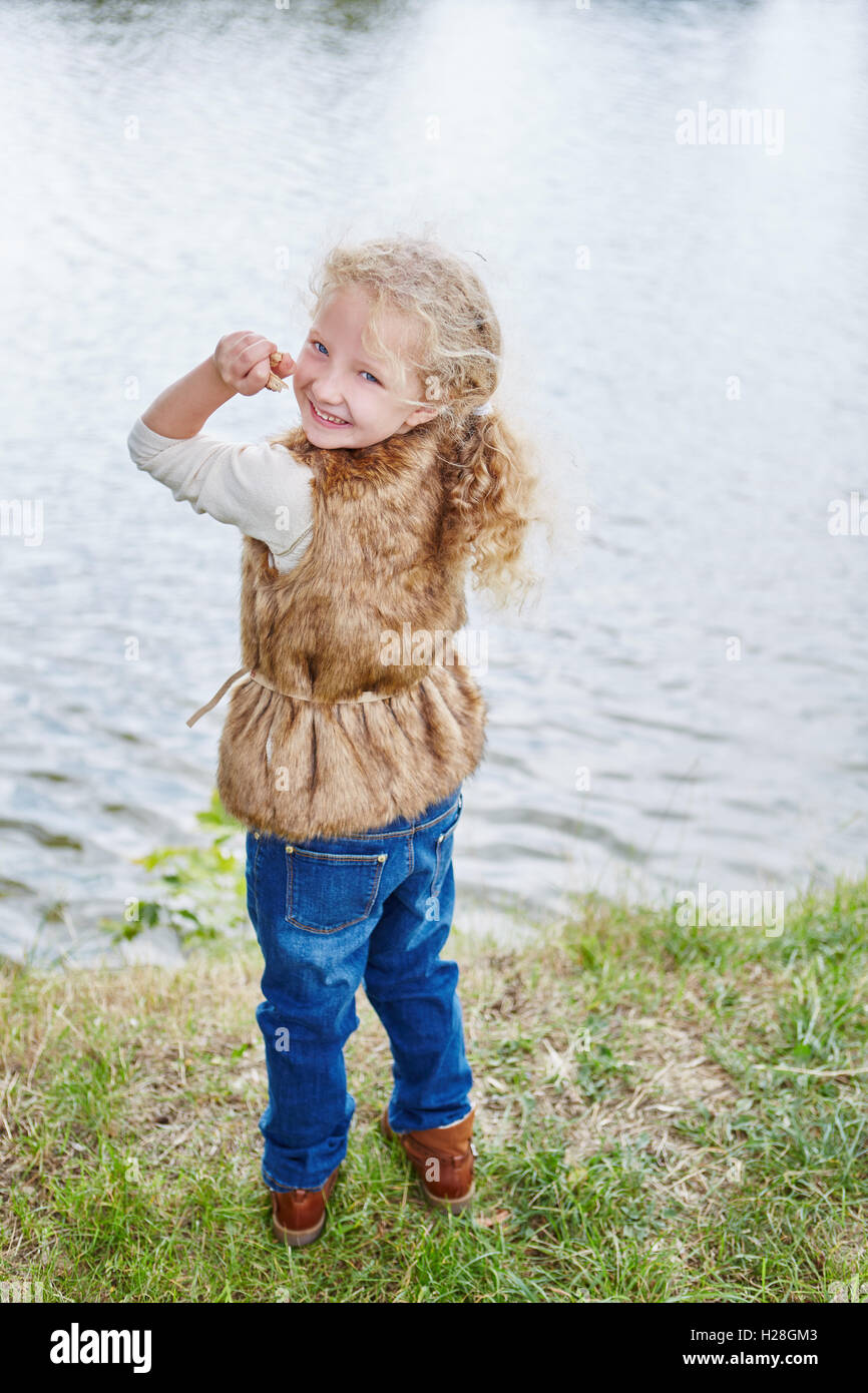 Happy girl lake hi-res stock photography and images - Alamy