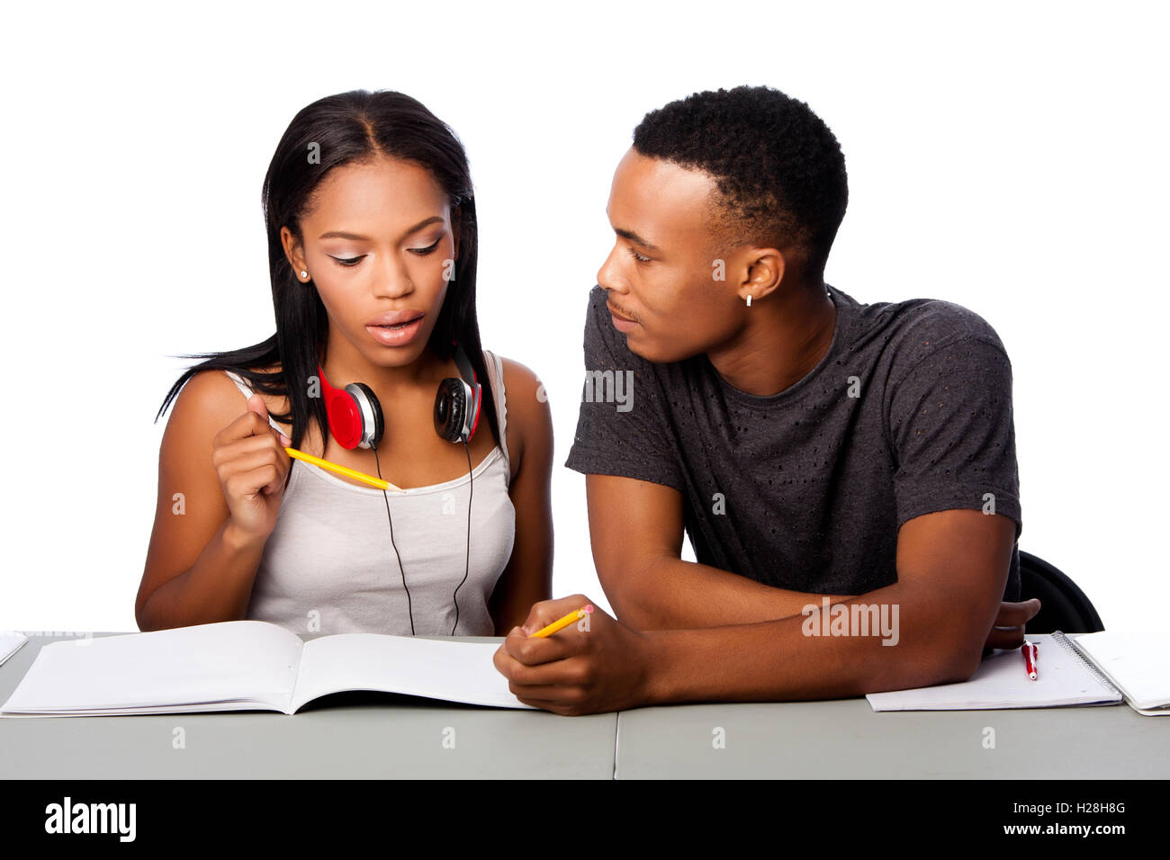 Two students happily studying together, on white Stock Photo - Alamy
