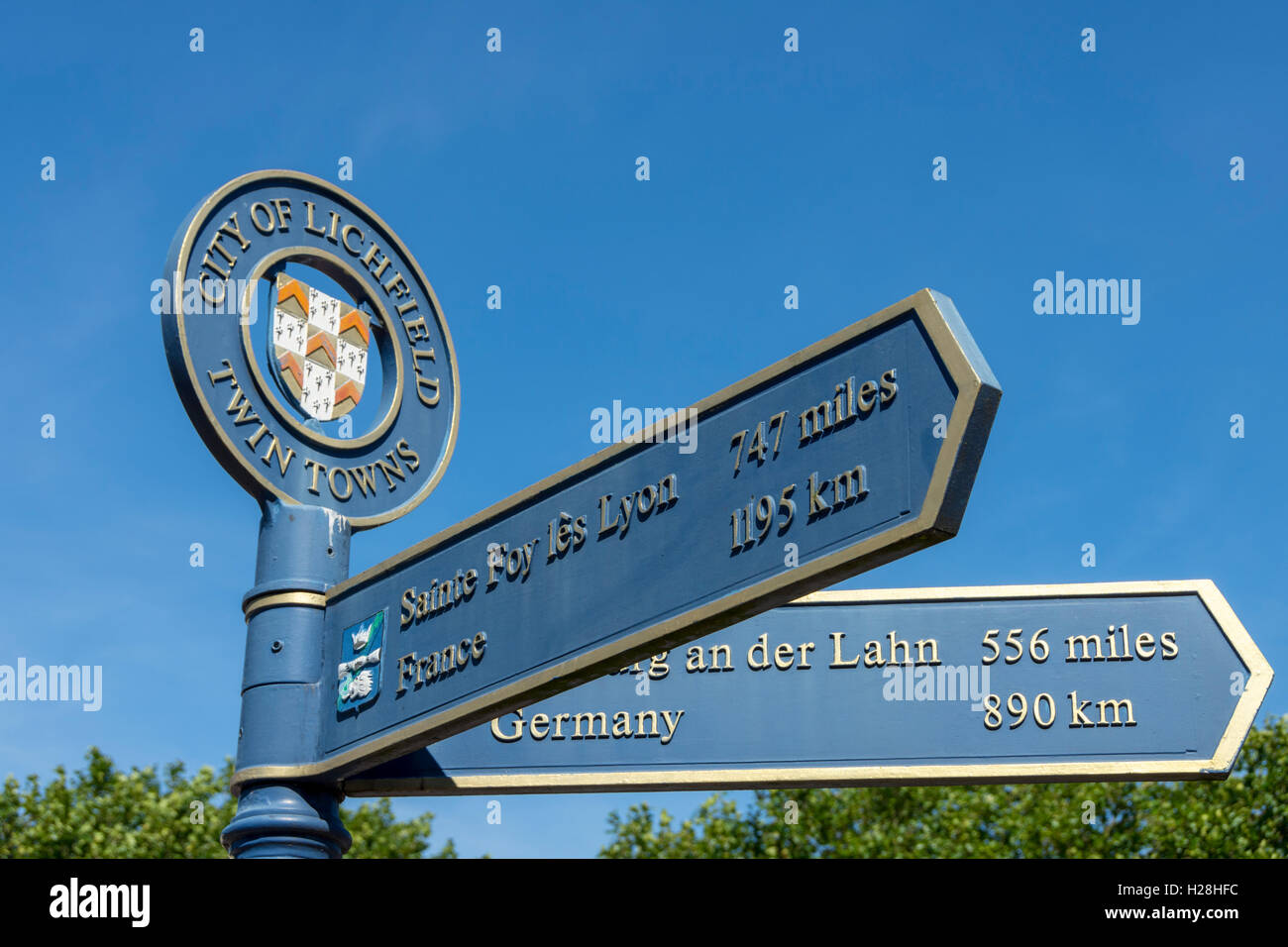Signpost pointing to Lichfield's twin towns, St. John Street, Lichfield ...