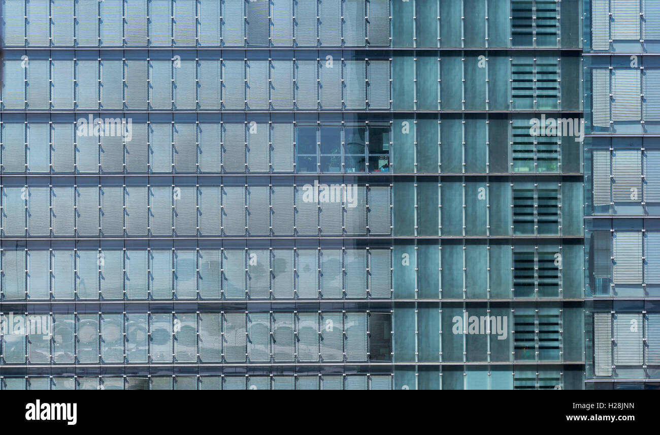 Corporate building with large glass windows Stock Photo - Alamy