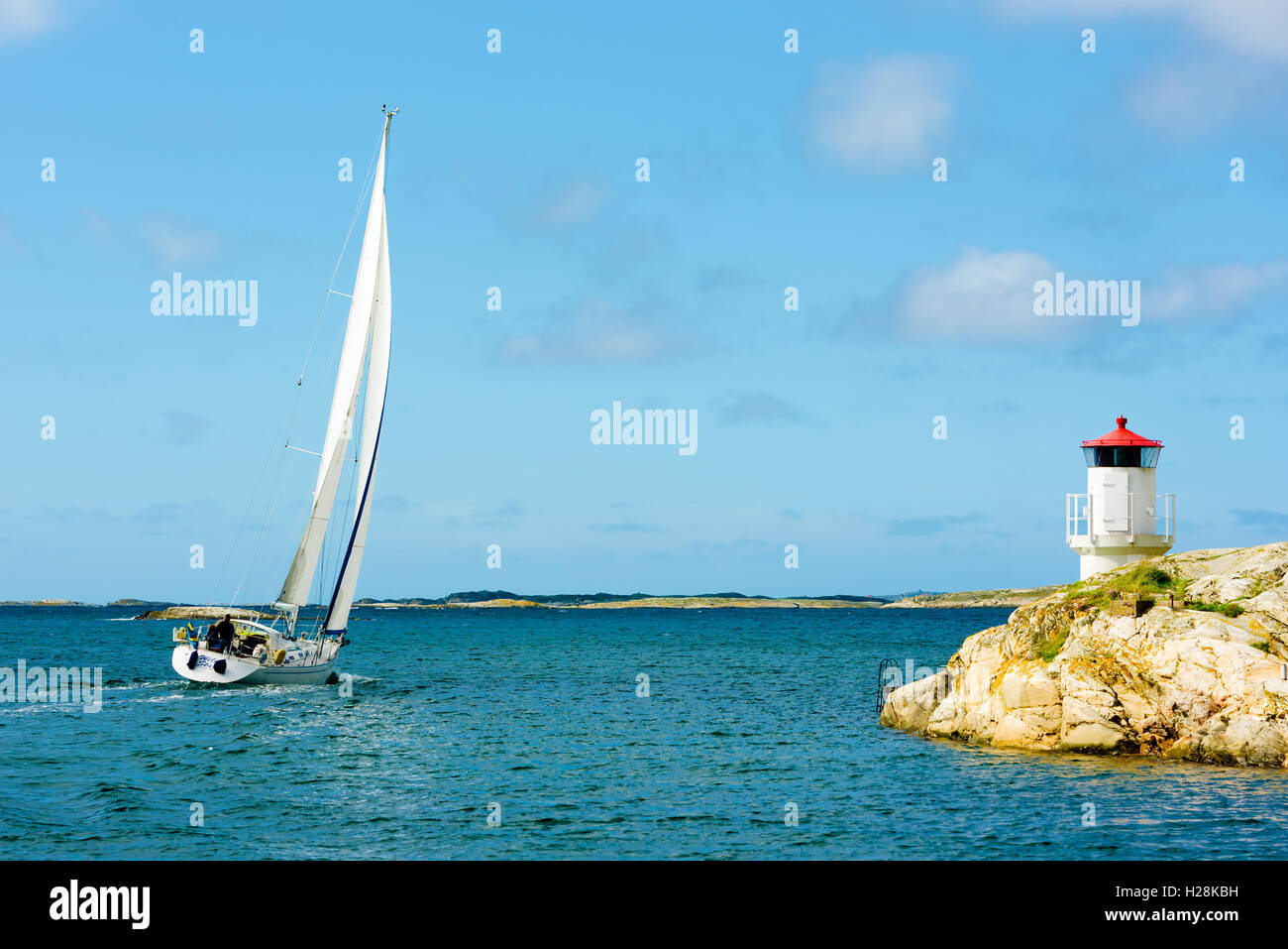 Lighthouse with boat hi-res stock photography and images - Alamy