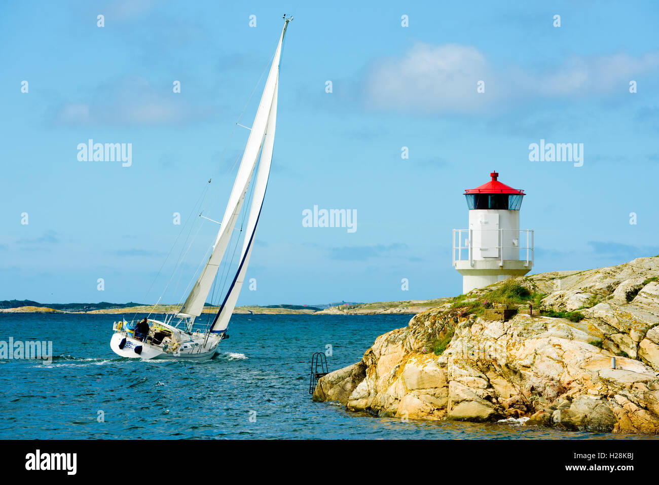 Lighthouse with boat hi-res stock photography and images - Alamy