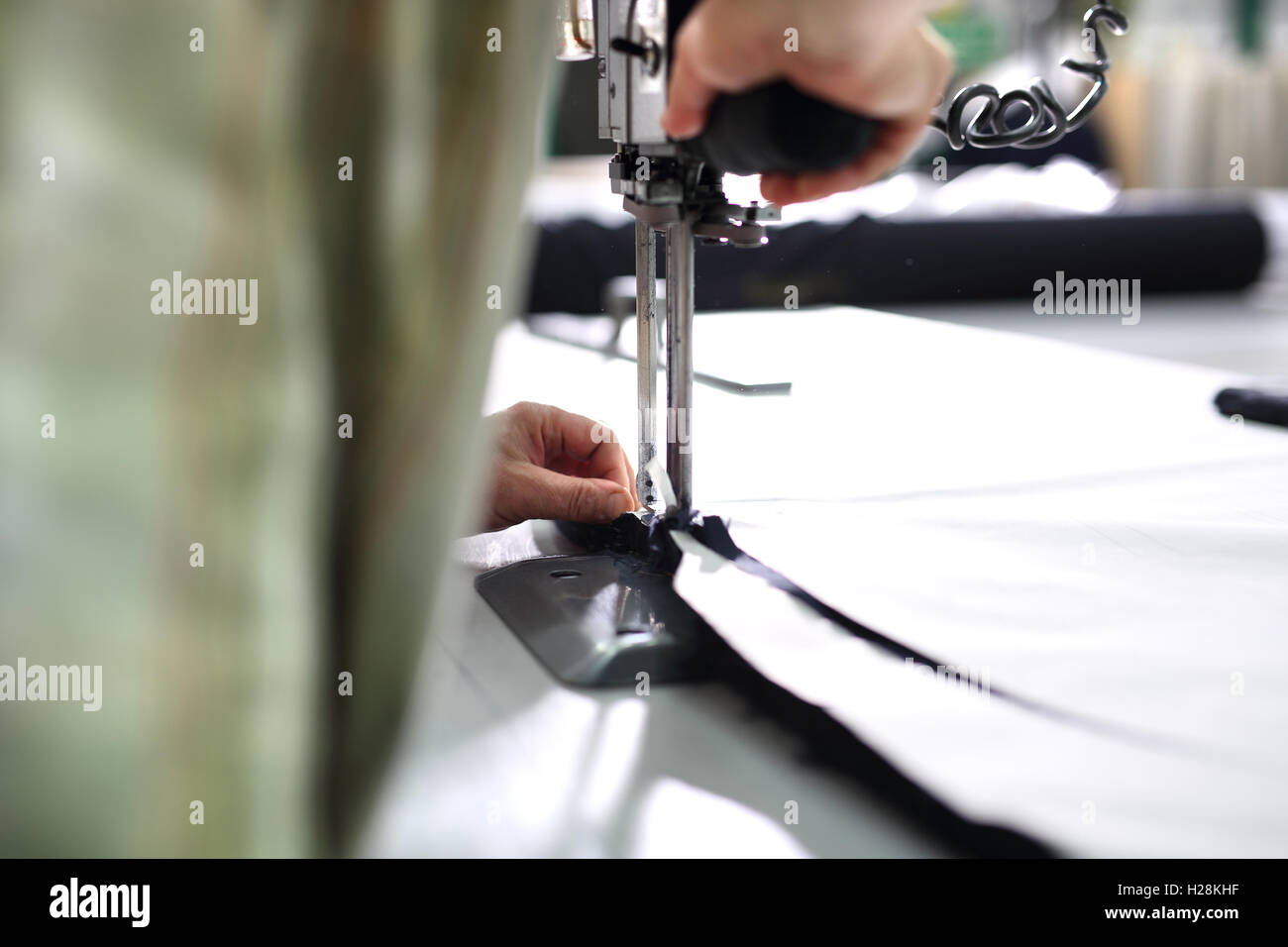 Manufacture of wearing apparel, cutting room Stock Photo - Alamy