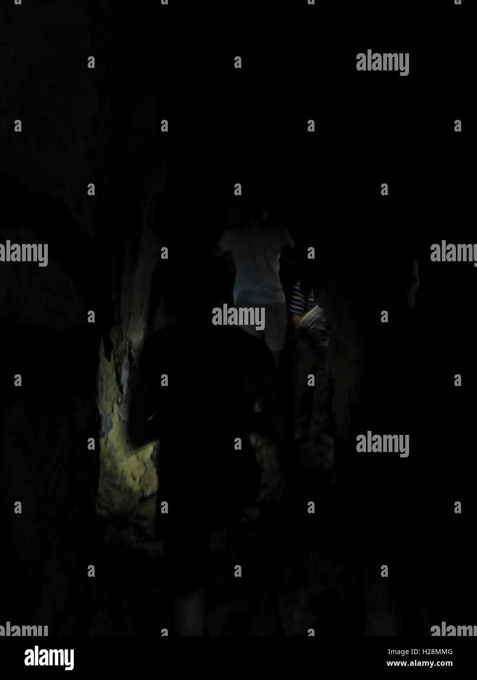 Some lights and shadows down in the cave Stock Photo - Alamy