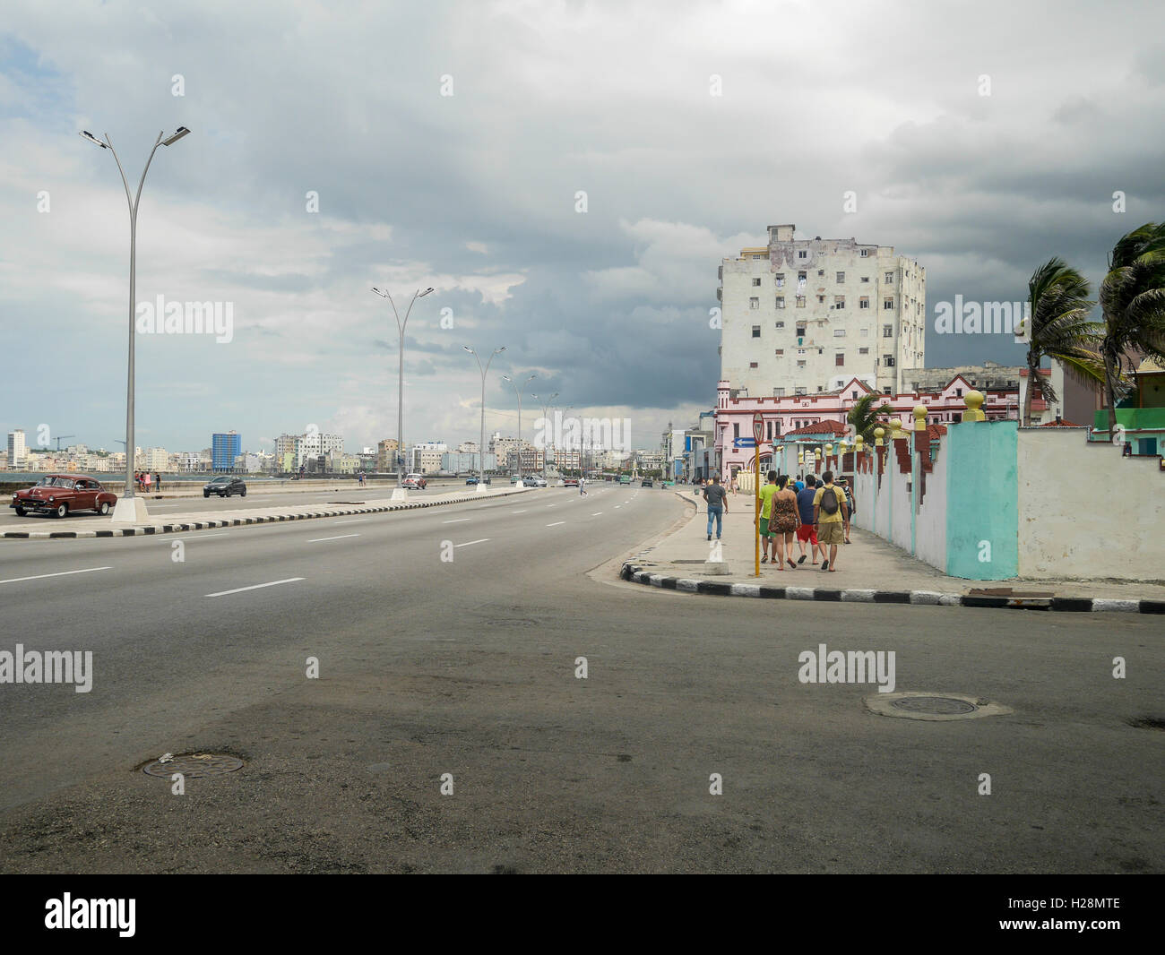 Roads in Cuba country, with old and new cars driving in the streets ...