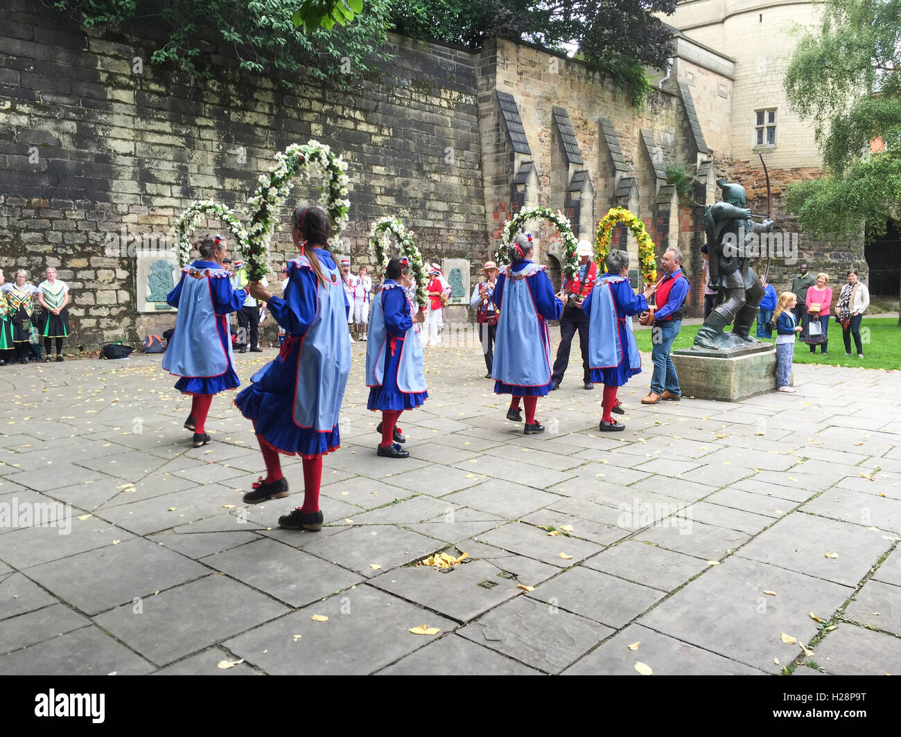 Morris dancers, performing, near Nottingham Castle. In Nottingham ...