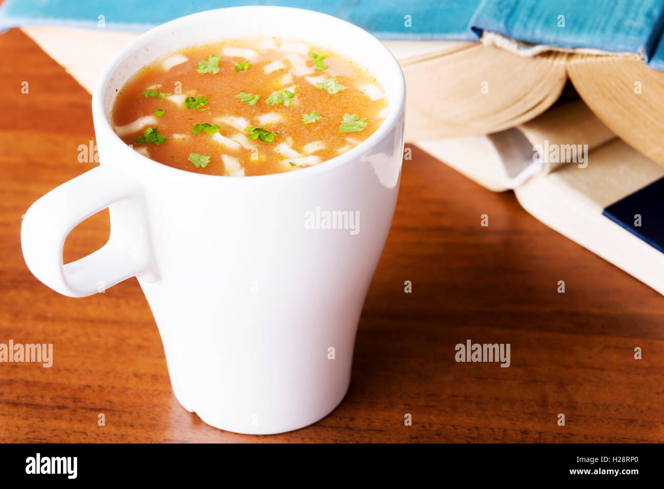 Hot vegetable soup in a cup Stock Photo - Alamy