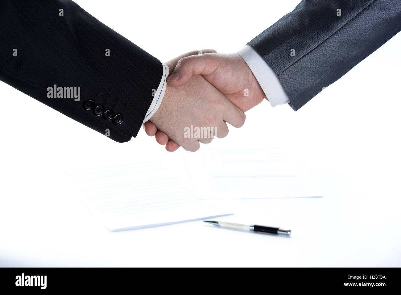 signing of the agreement and a handshake Stock Photo - Alamy
