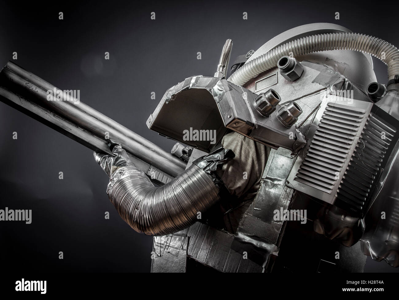 Spaceship, Astronaut on a black background with huge weapon Stock Photo ...