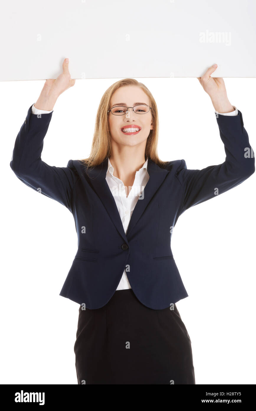 Beautiful young business woman holding copy space Stock Photo - Alamy
