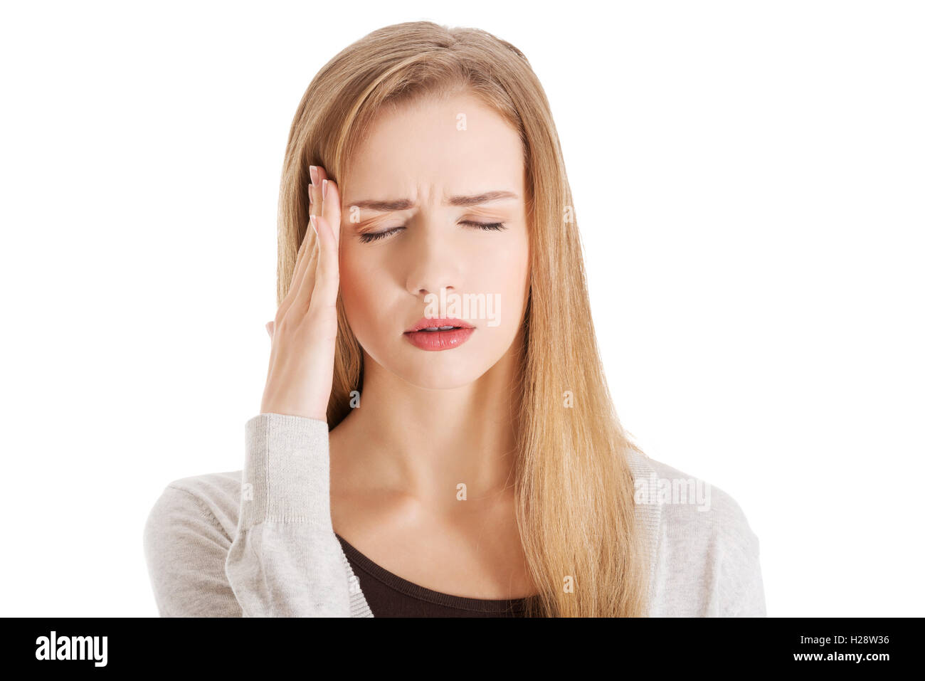 Beautiful woman's portrait, having headache Stock Photo - Alamy