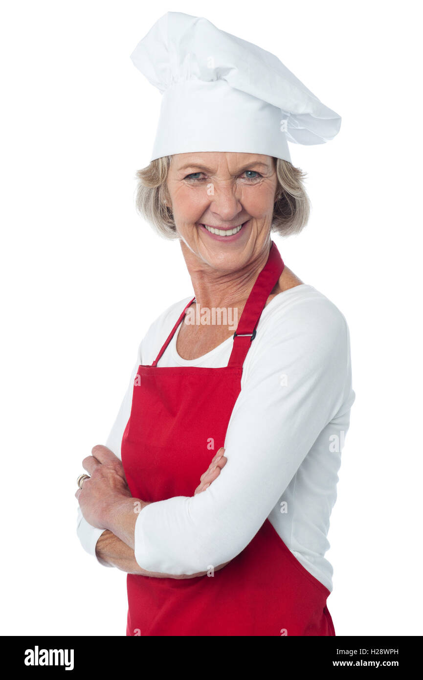 Cheerful confident aged female chef Stock Photo - Alamy
