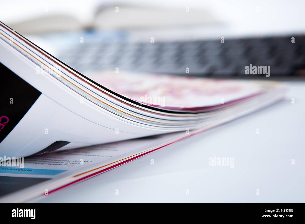 pages of journal and keyboard close-up Stock Photo - Alamy