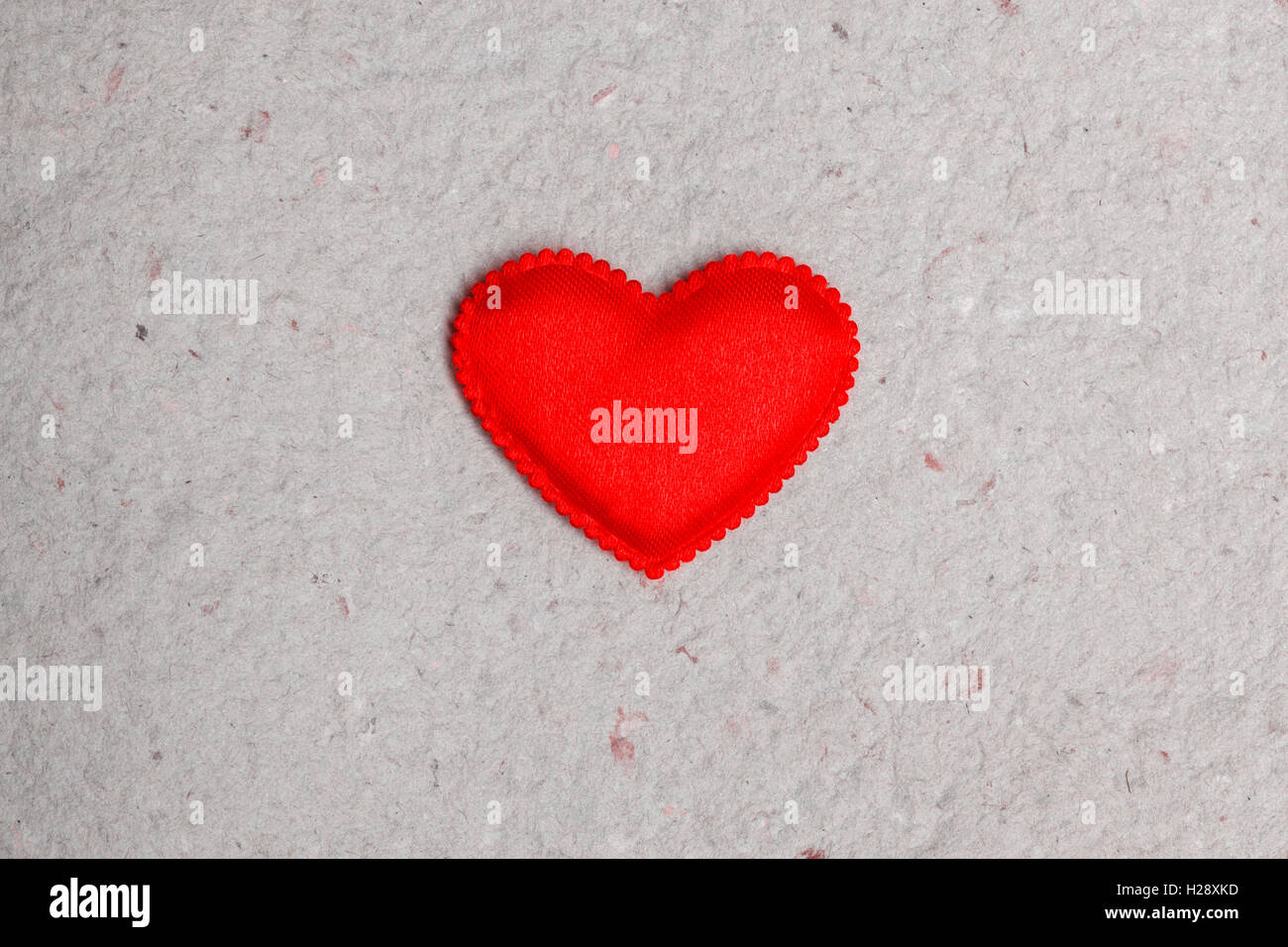 red heart on vintage paper background Stock Photo - Alamy