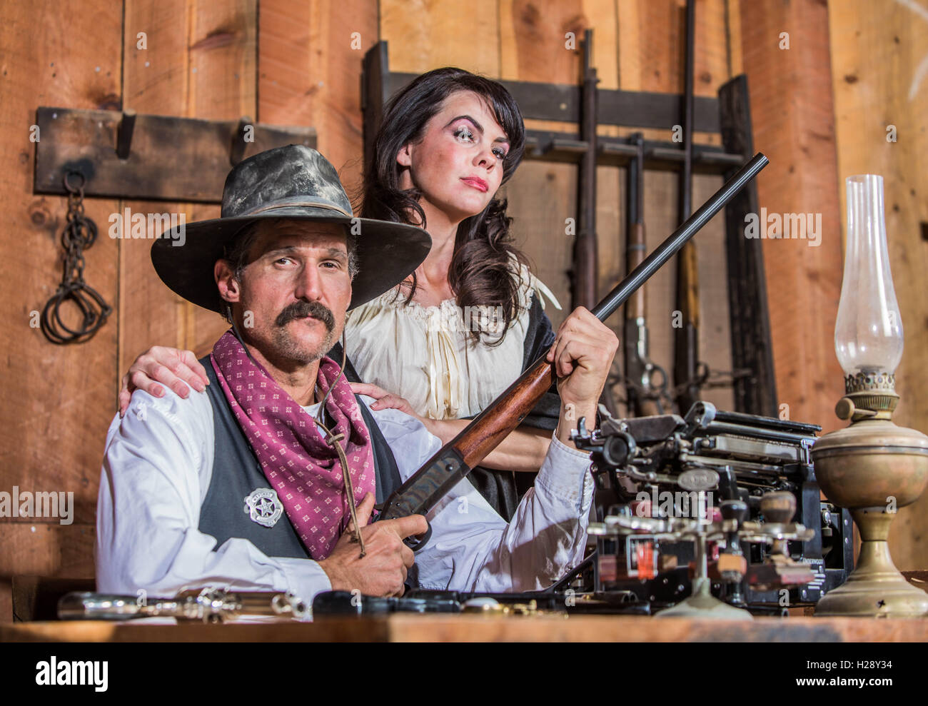 Western Sheriff Poses With Woman Stock Photo - Alamy