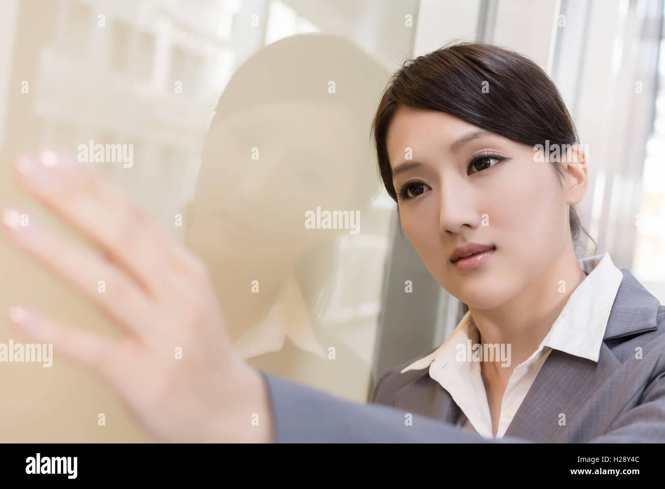 Asian business woman thinking and feel sorrow Stock Photo - Alamy