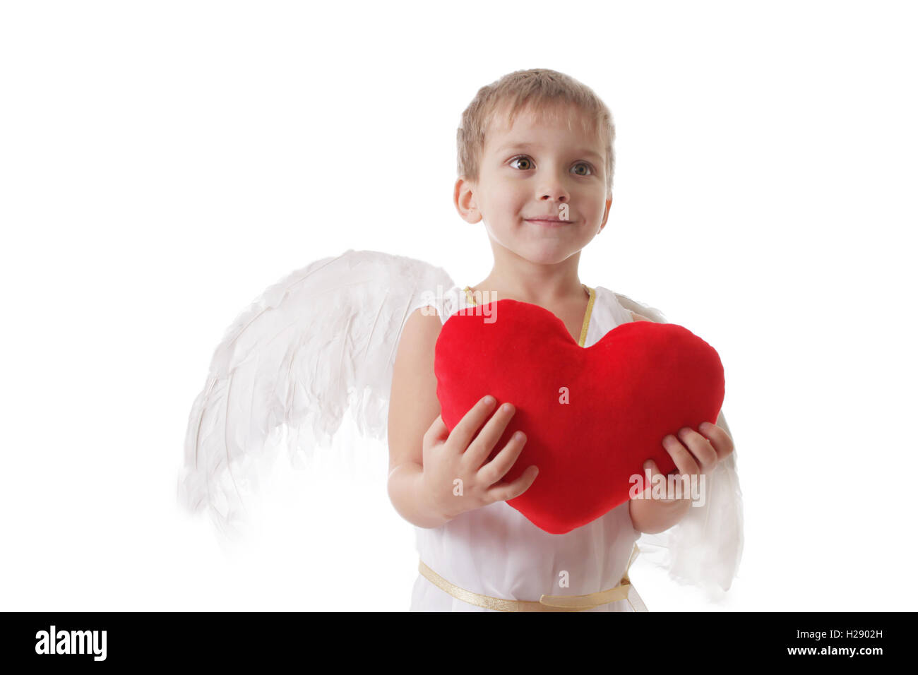 Cute smiling cupid with heart in a hands Stock Photo - Alamy