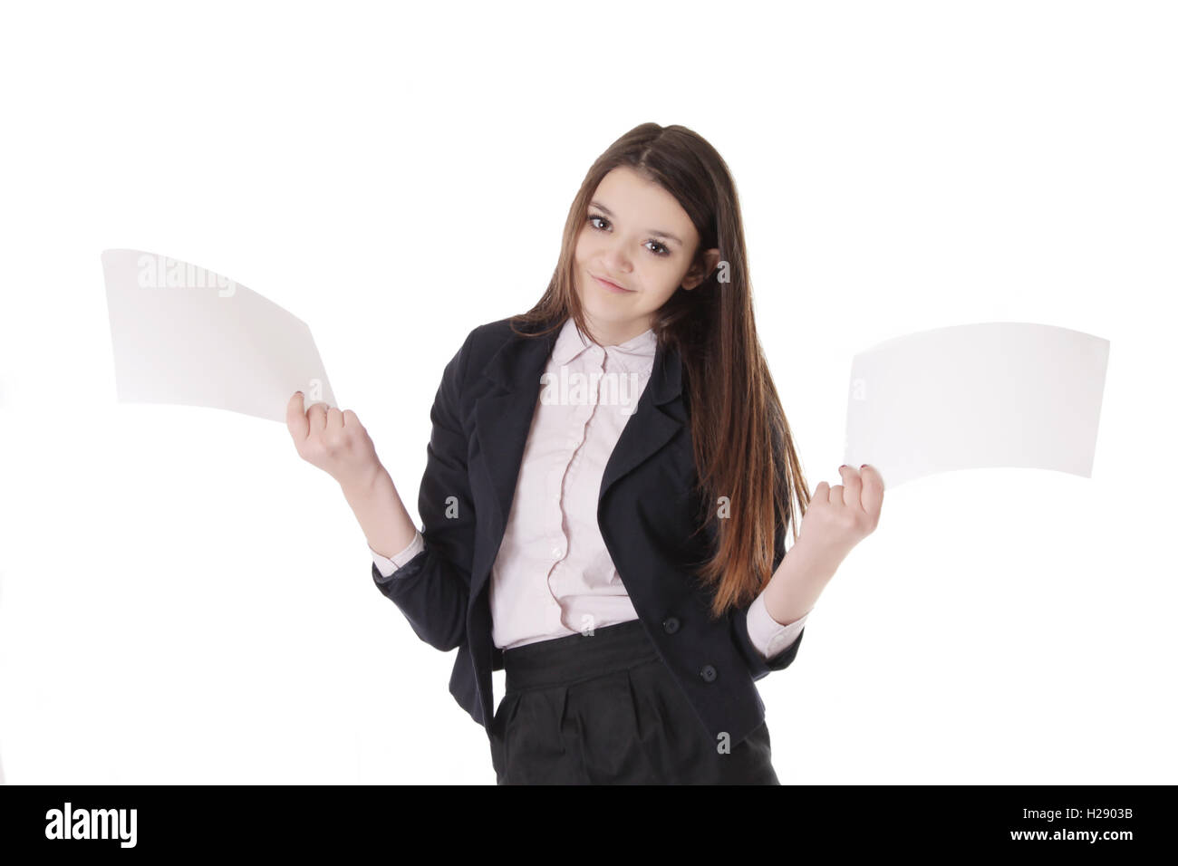 Disappointed student girl with two sheets of paper Stock Photo - Alamy