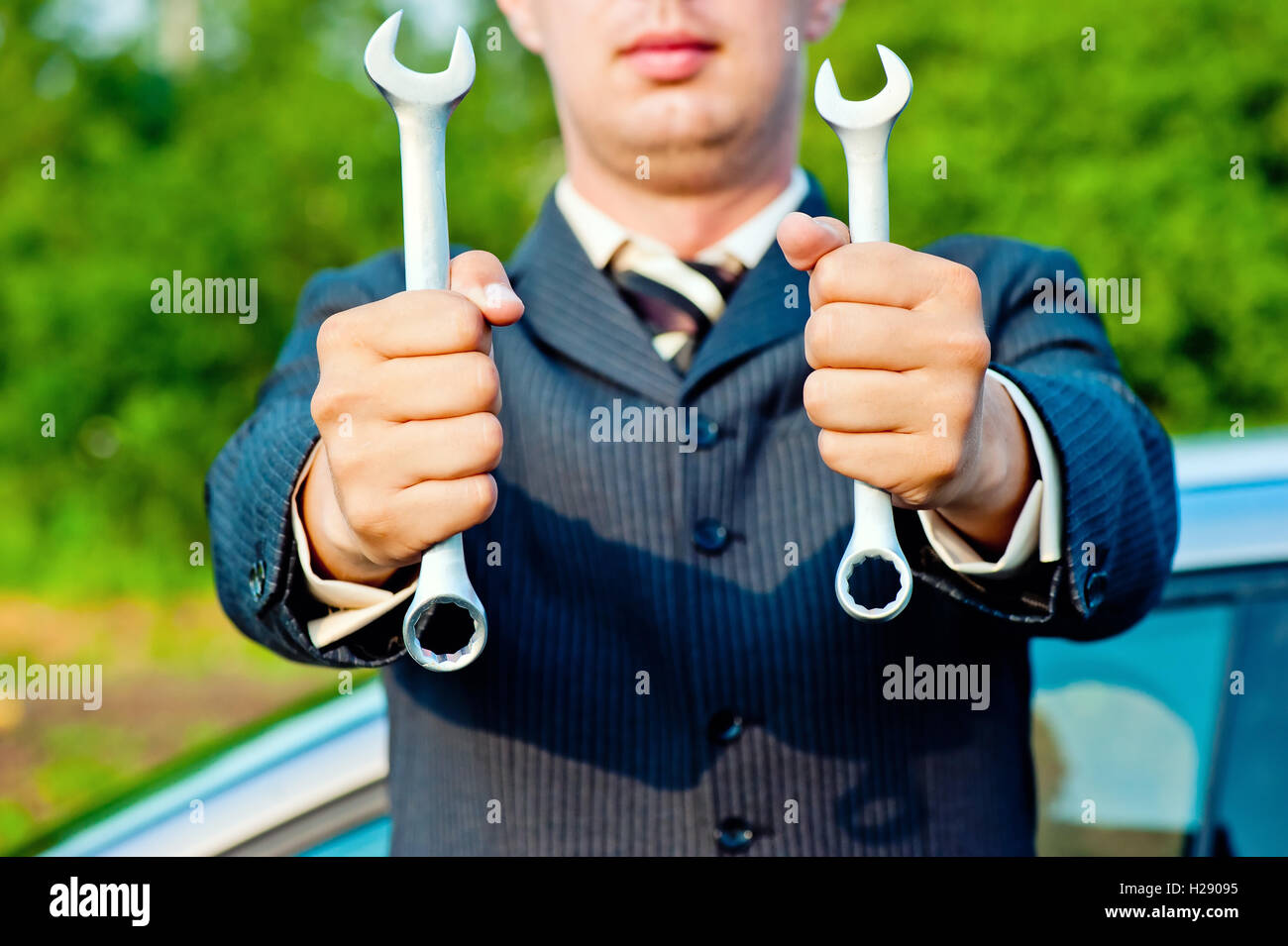 Man suit spanner wrench hi-res stock photography and images - Alamy