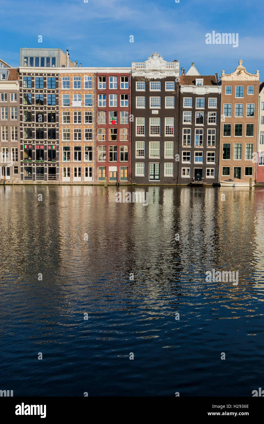 Traditional dutch buildings on a canal in Amsterdam Holland Stock Photo ...