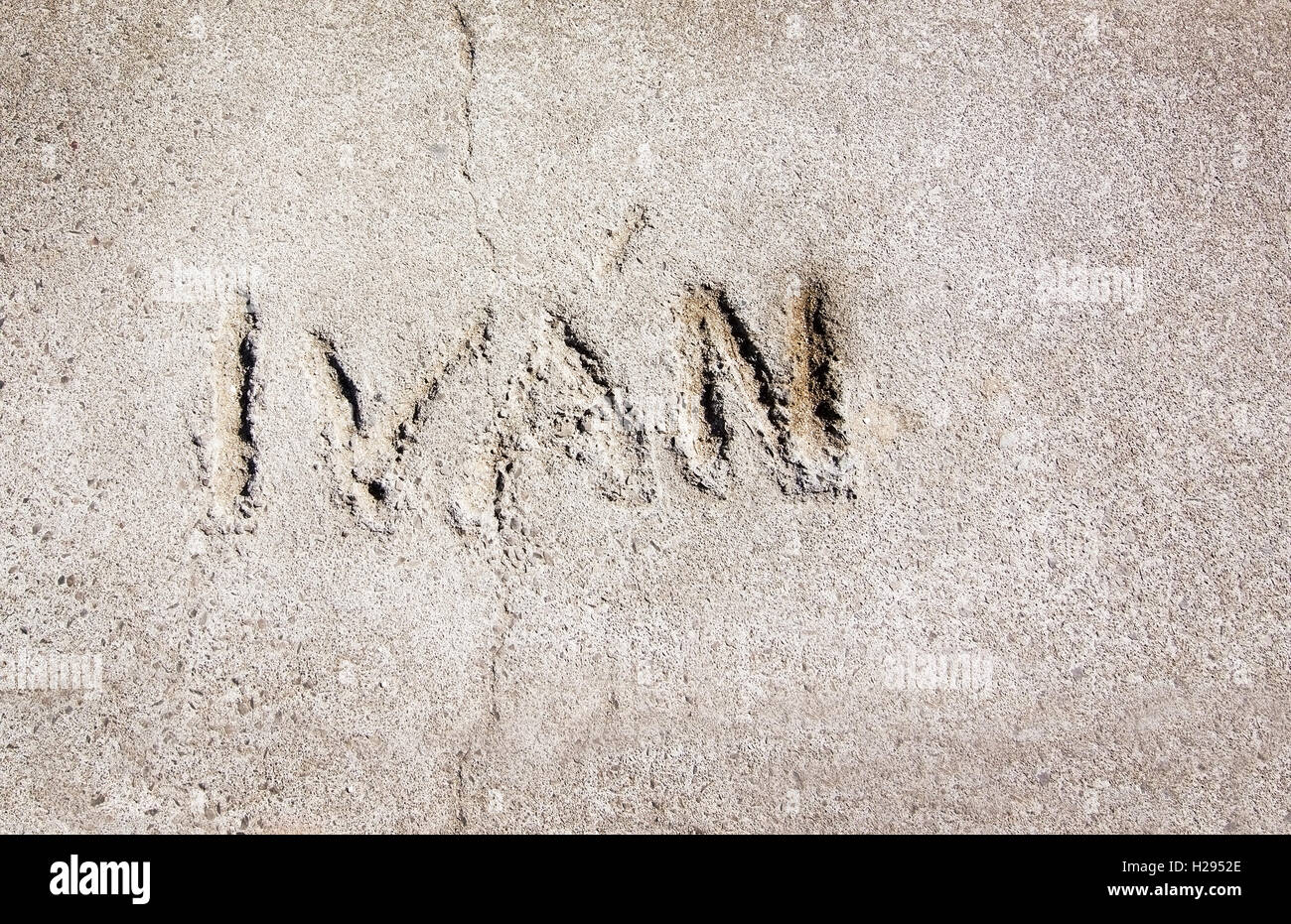 The name Ivan written in concrete closeup Stock Photo - Alamy