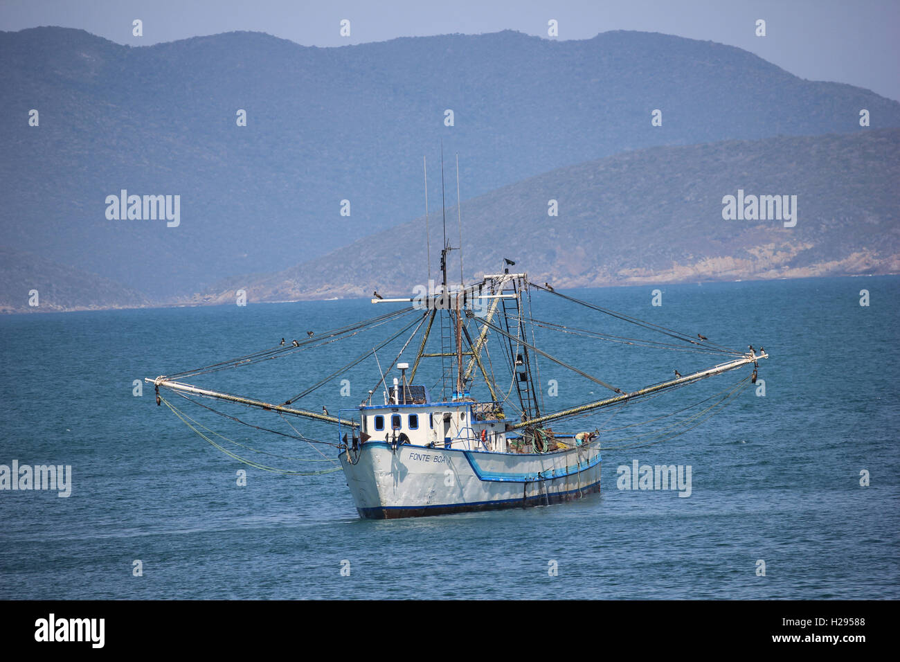 Brazilian fishing boat seen in the sea of Cabo Frio city in the Lakes ...