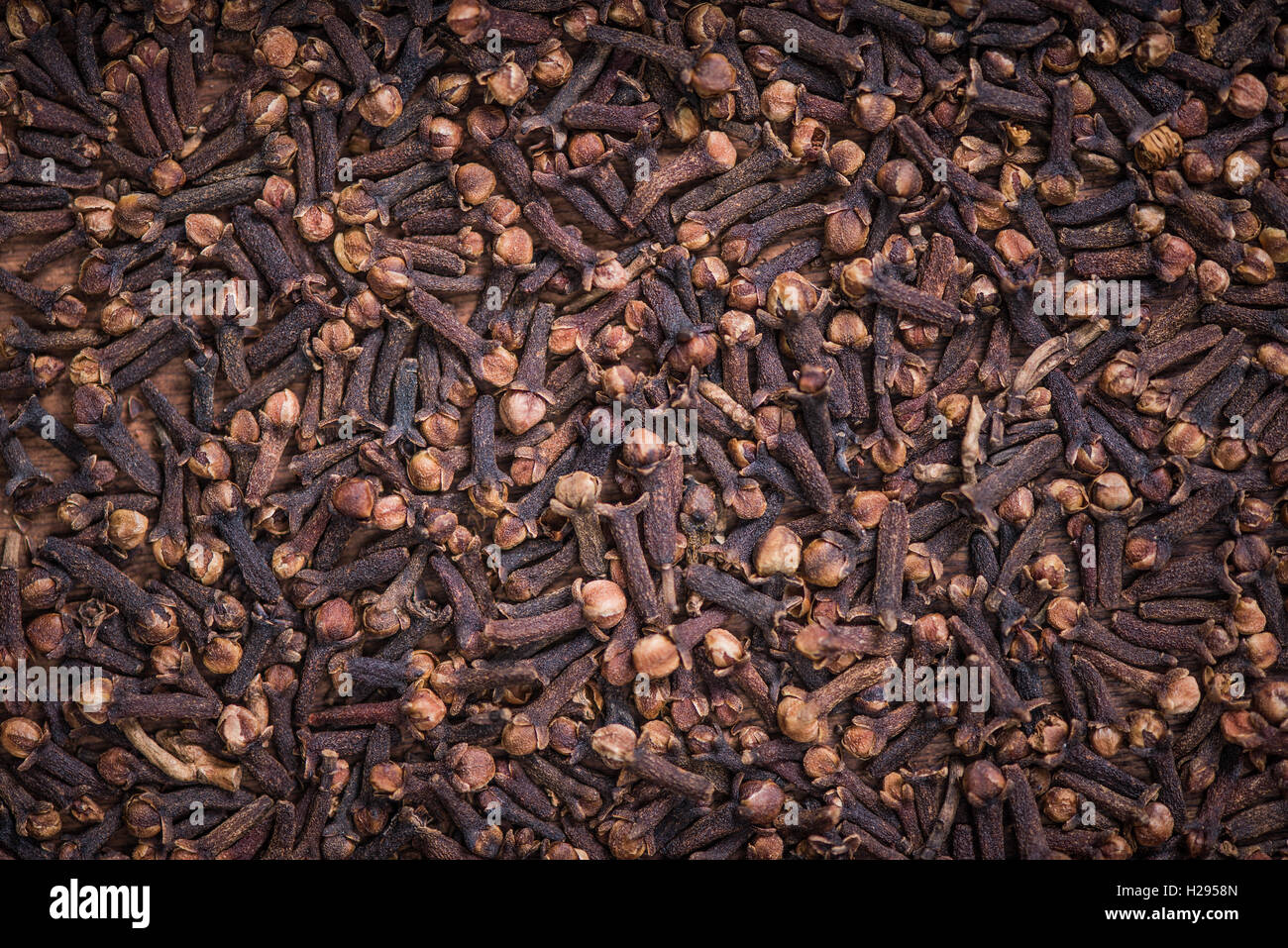 Clave spice background, close up view Stock Photo - Alamy