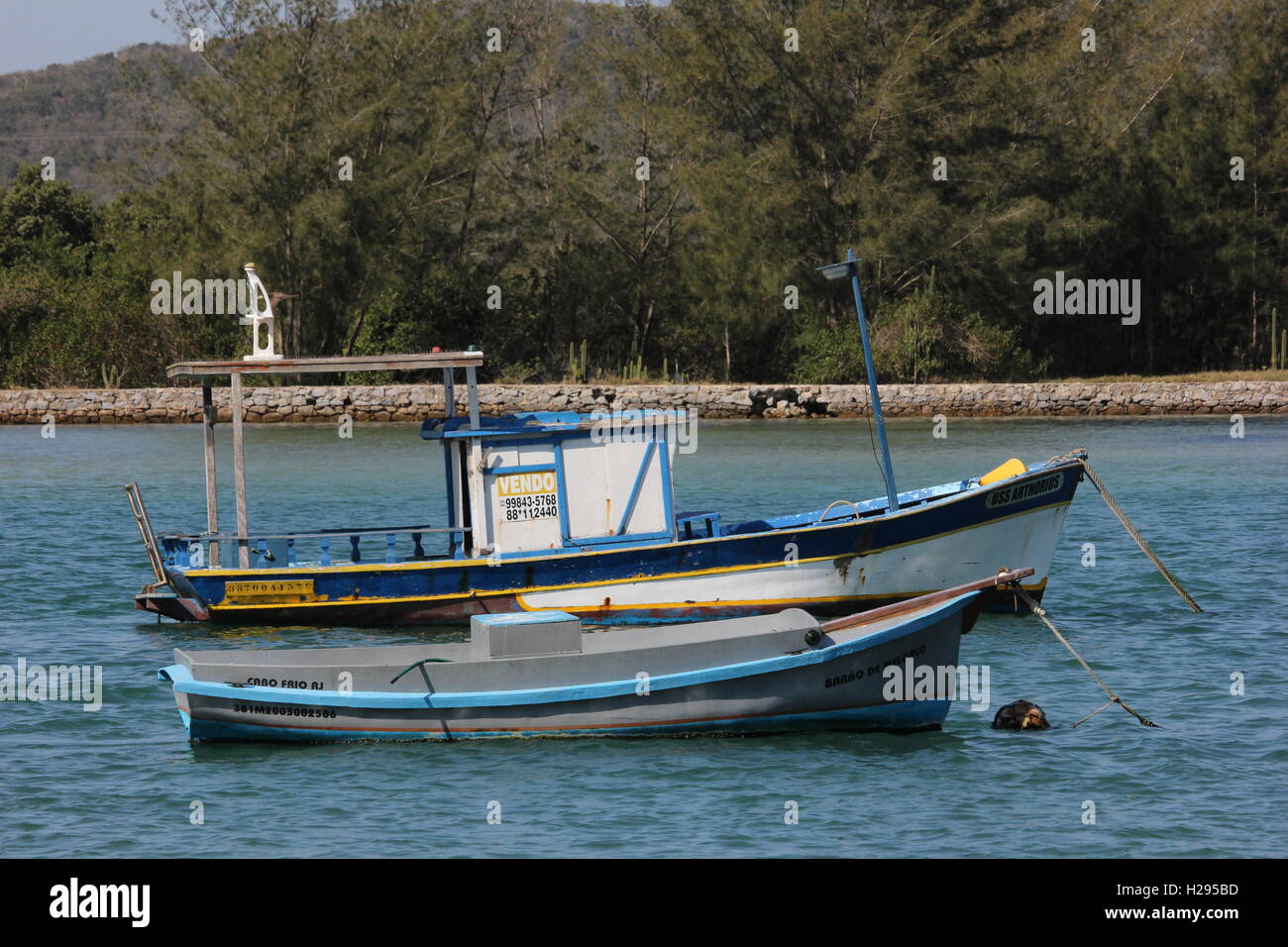 Wooden boats anchored in Itajuru Canal, a connection point between the ...