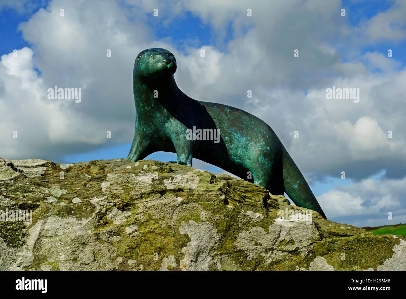 Gavin Maxwell memorial, a bronze otter on rocks at Monreith in Dumfries ...