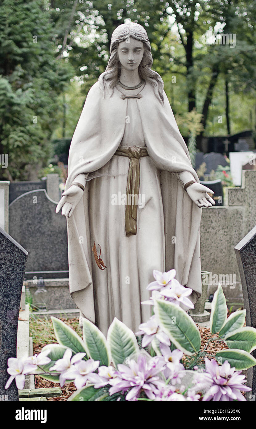 Statue of Mary, the mother of Jesus, decaying hands. Statue of is ...