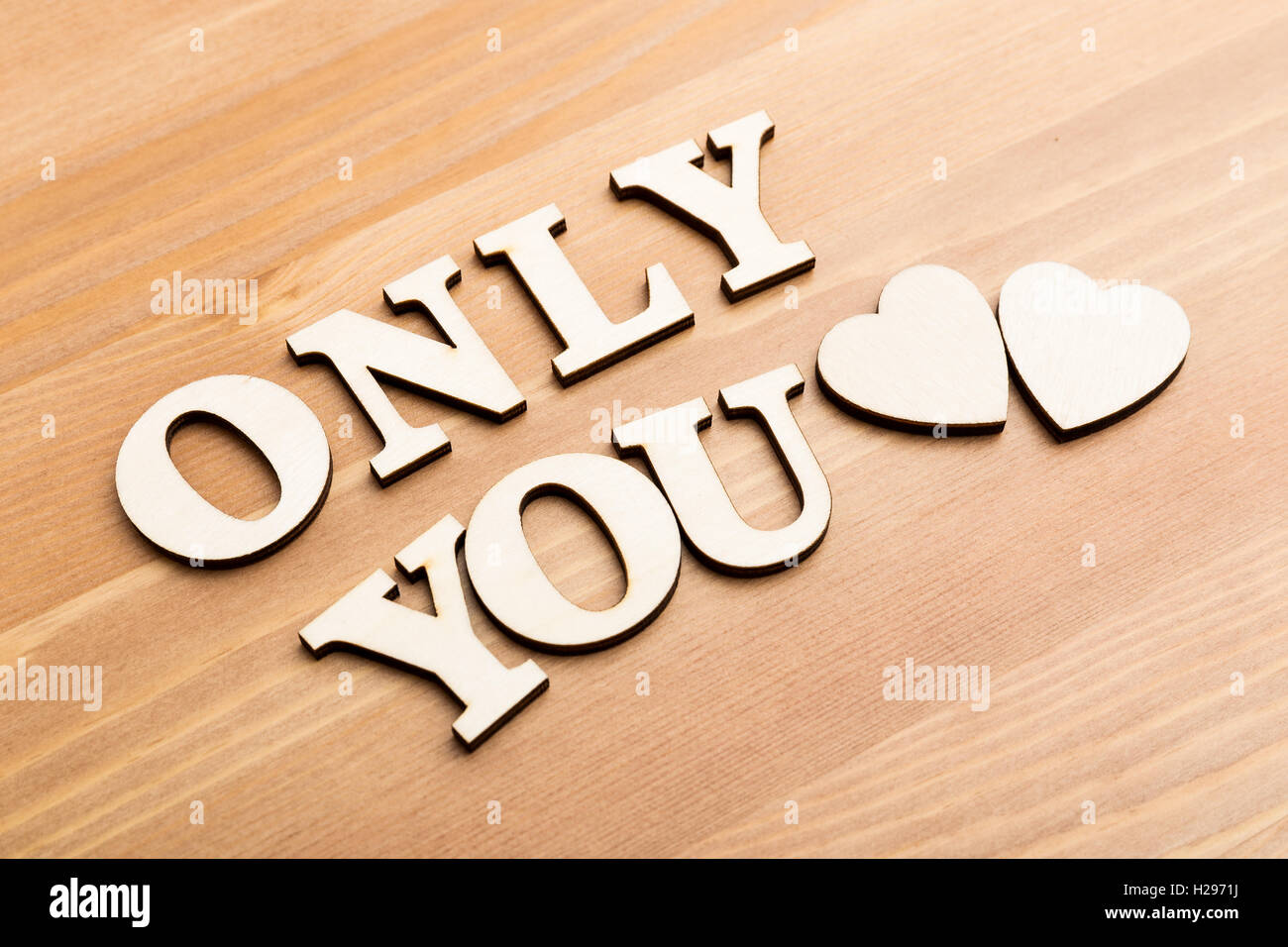 Only You wooden text Stock Photo - Alamy