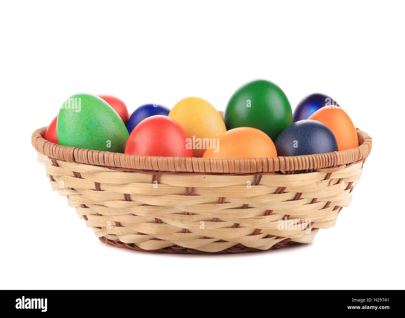 Easter eggs and basket isolated Stock Photo - Alamy