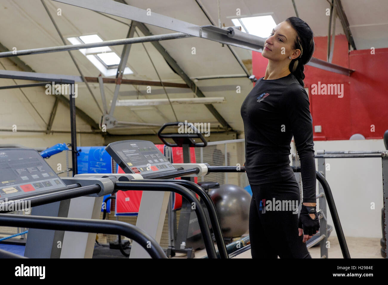 young female working out on a treadmill in a gym england uk Stock Photo ...
