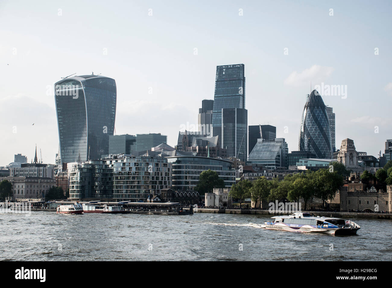 The City of London financial District skyline river view with boat ...