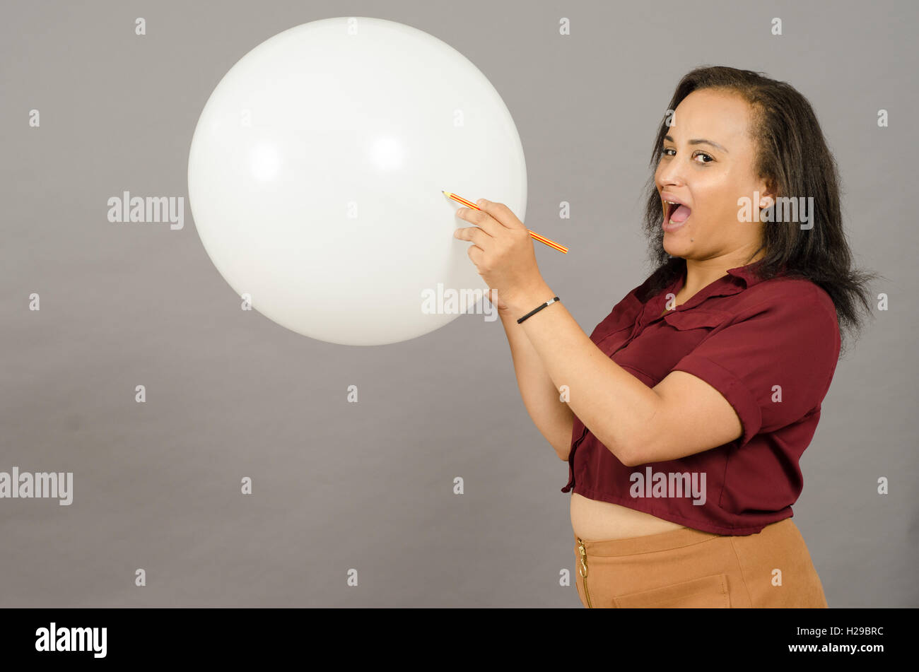 Bursting balloon hi-res stock photography and images - Alamy