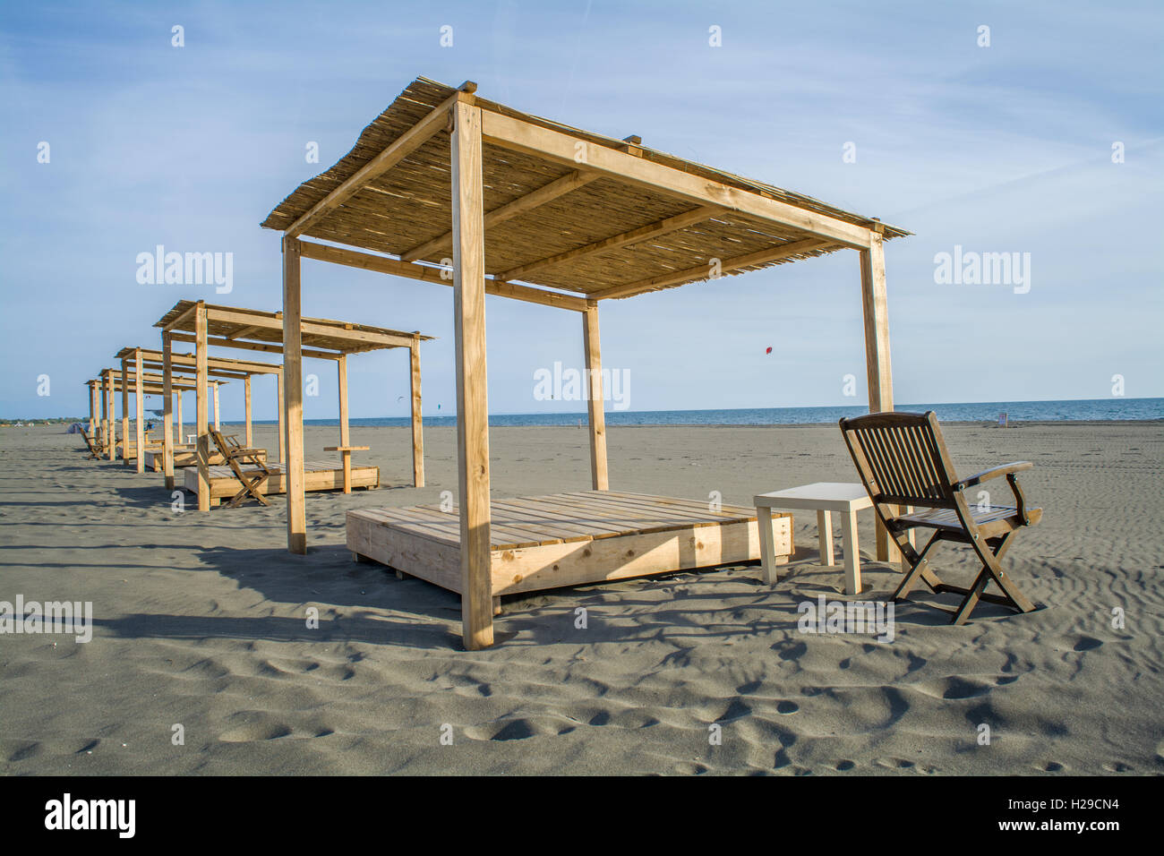 Wooden beds on the beach Stock Photo - Alamy