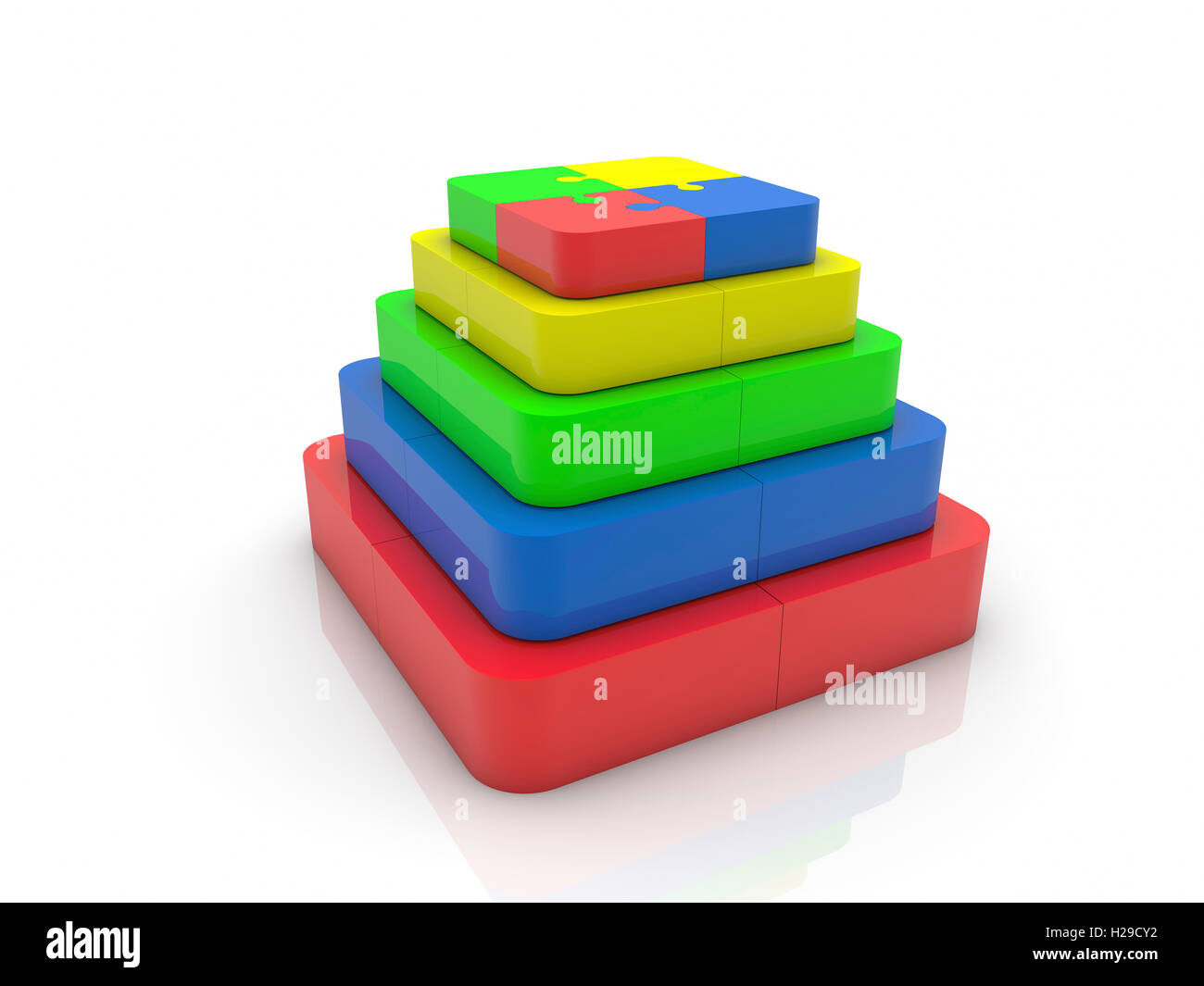 Pyramid of puzzle pieces in various colors on white Stock Photo - Alamy