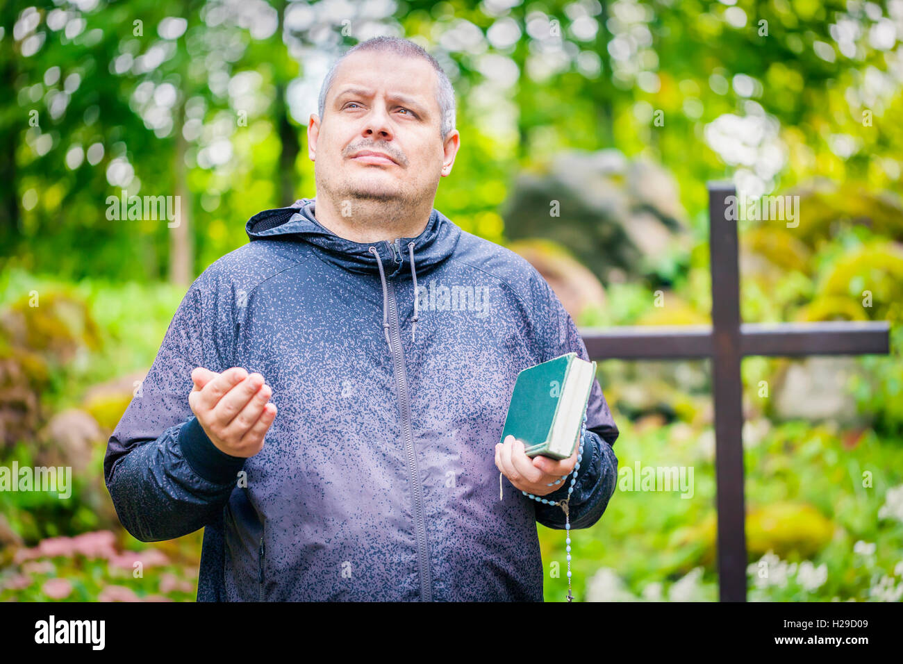 Preacher with Bible at outdoors Stock Photo - Alamy