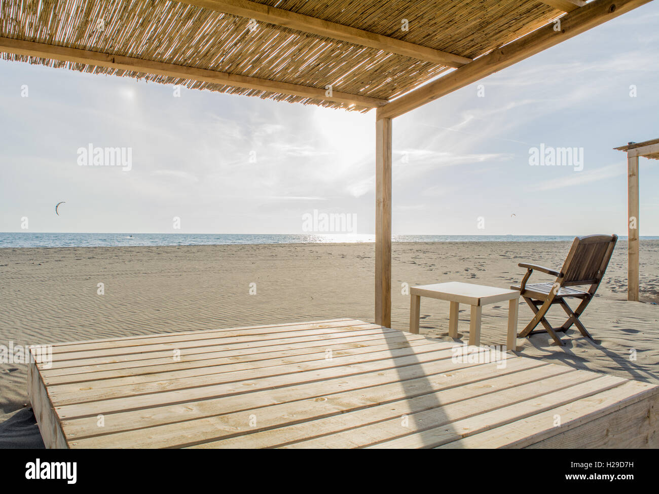 Wooden beds on the beach Stock Photo - Alamy