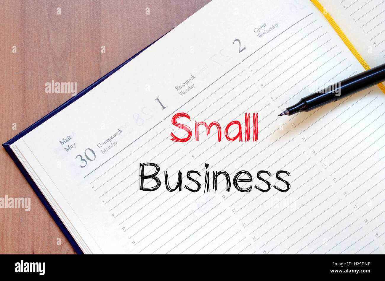 Small business text concept write on notebook Stock Photo - Alamy