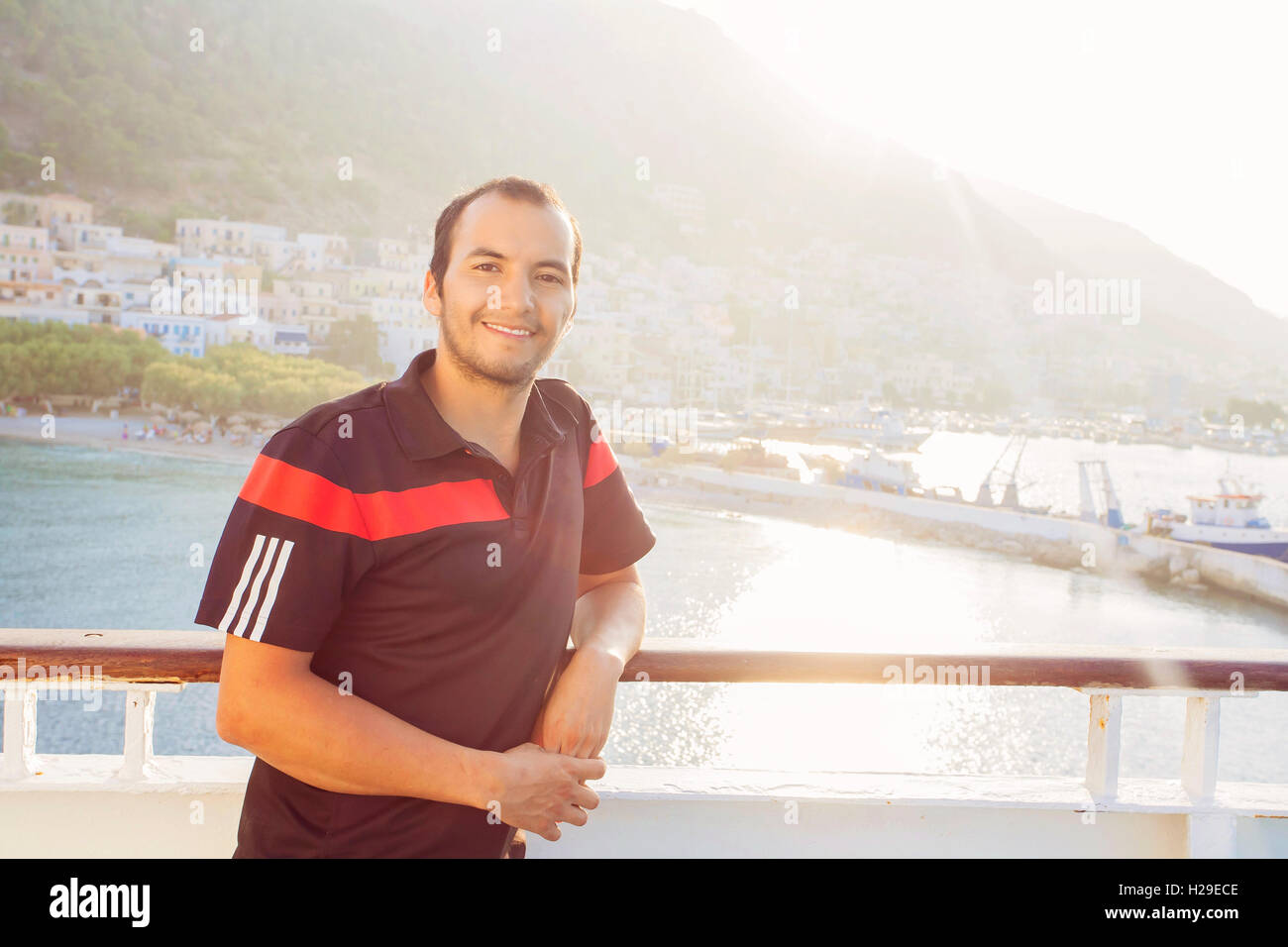 Greece man boat smiling hi-res stock photography and images - Alamy