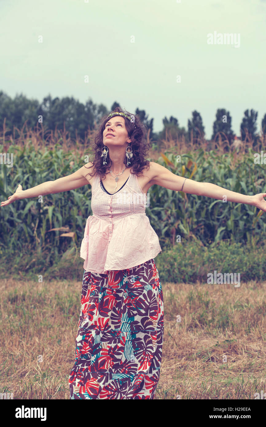 Beautiful woman in nature waiting for the rain Stock Photo - Alamy