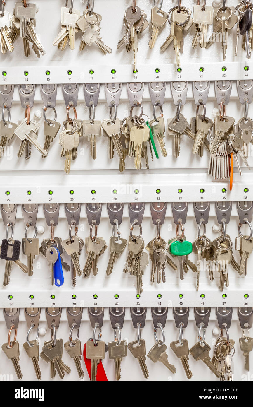 an electronic key cabinet with different keys Stock Photo - Alamy