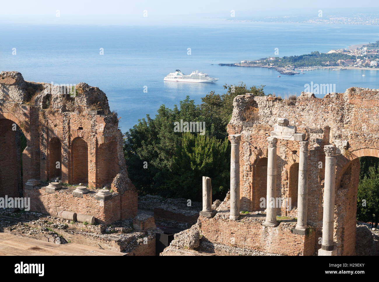A cruise ship moored off Giardini Naxos, seen from the ancient Greek ...