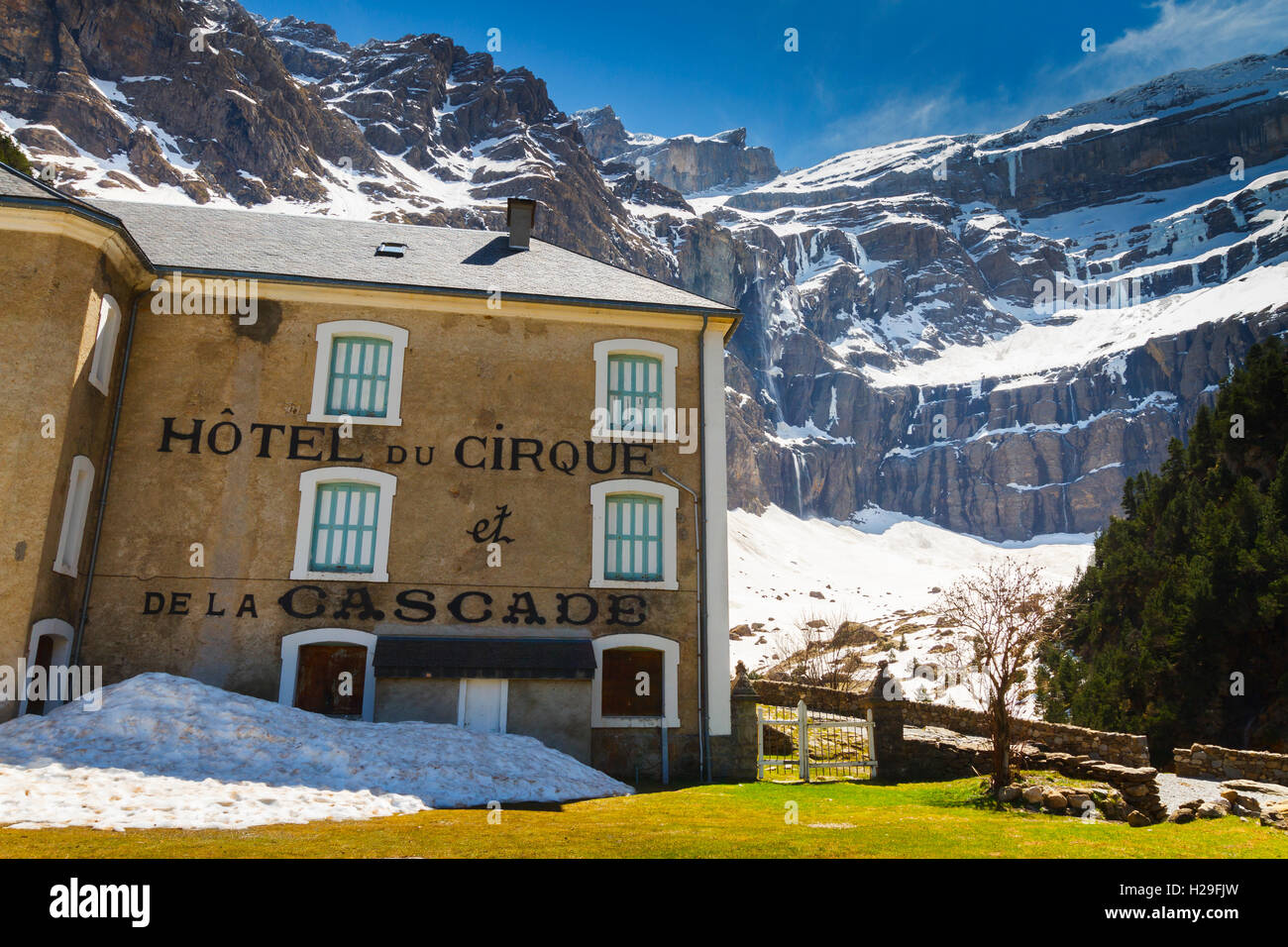 Hotel and snow-covered mountain landscape Stock Photo - Alamy