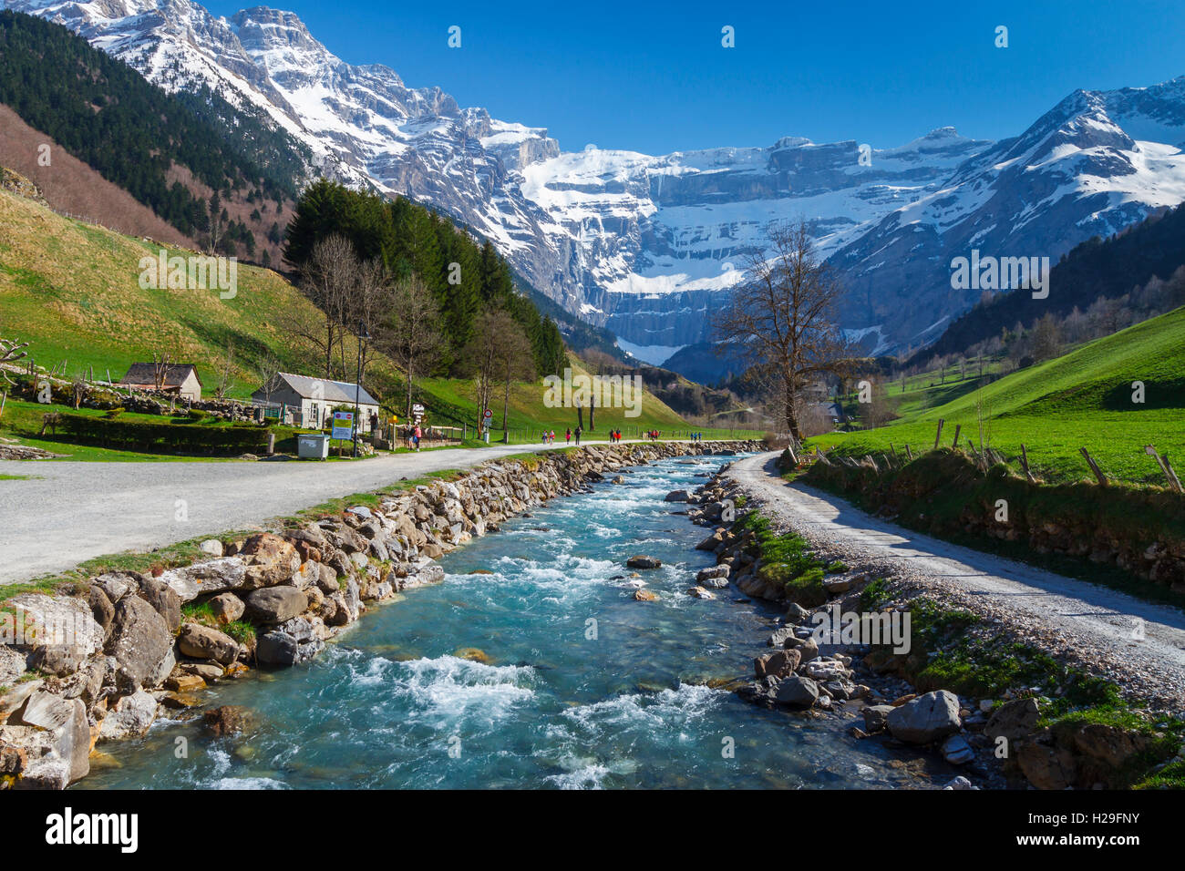 Snow-covered mountains and river Stock Photo - Alamy