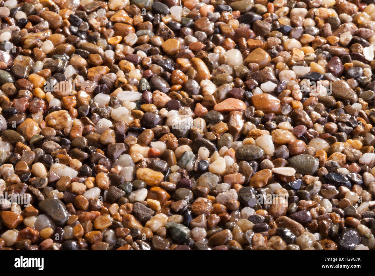 Coloured stone chip / gravel surface Stock Photo - Alamy