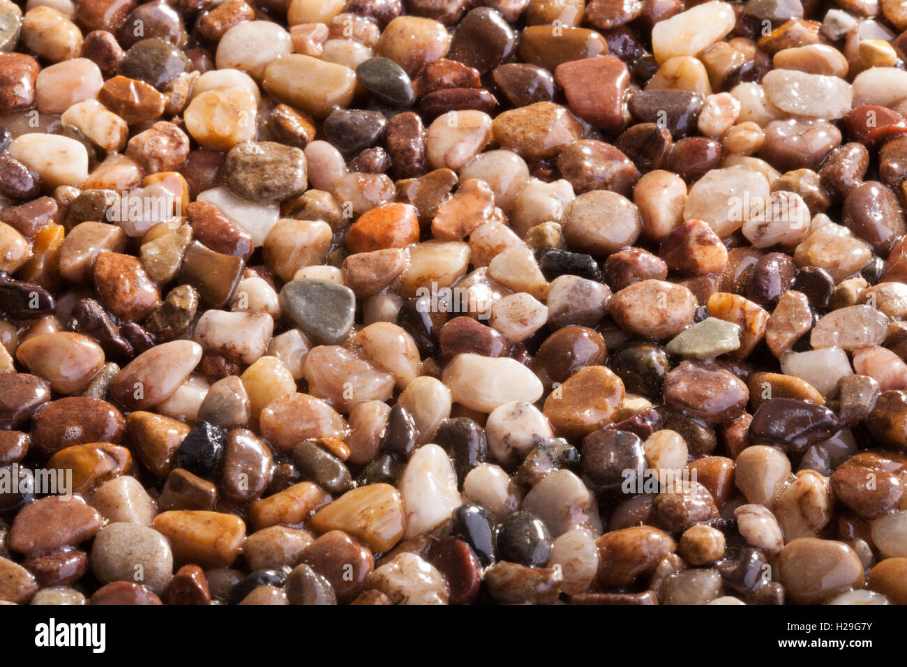 Coloured stone chip / gravel surface Stock Photo - Alamy